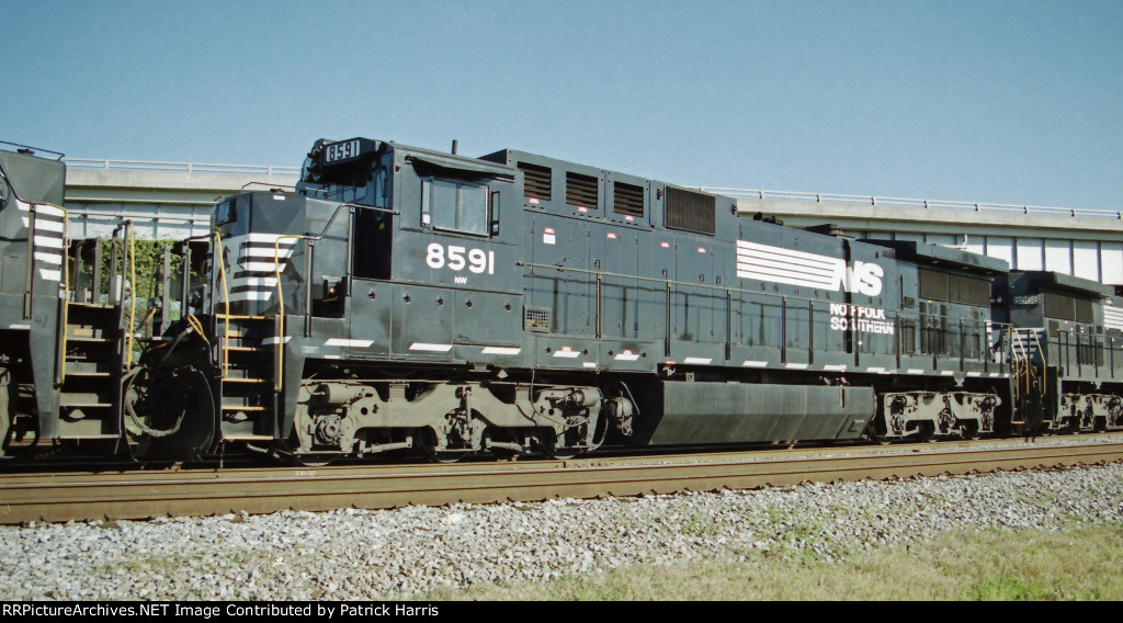 NS 8591 C39-8 moving south through Oliver Junction to NS Oliver Yard in New Orleans La under ...